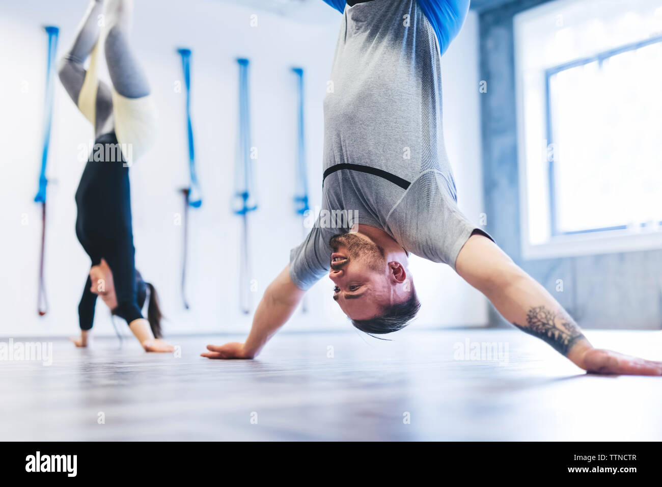 Woman Hanging Upside Down From High Resolution Stock Photography and ...