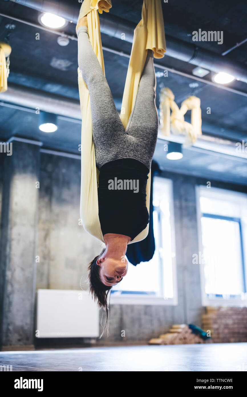 Woman Hanging Upside Down From High Resolution Stock Photography and ...