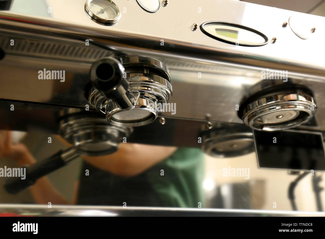 Bottomless portafilter in automatic coffee machine Stock Photo - Alamy