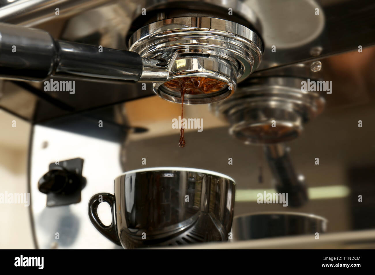 Automatic coffee machine preparing espresso Stock Photo - Alamy