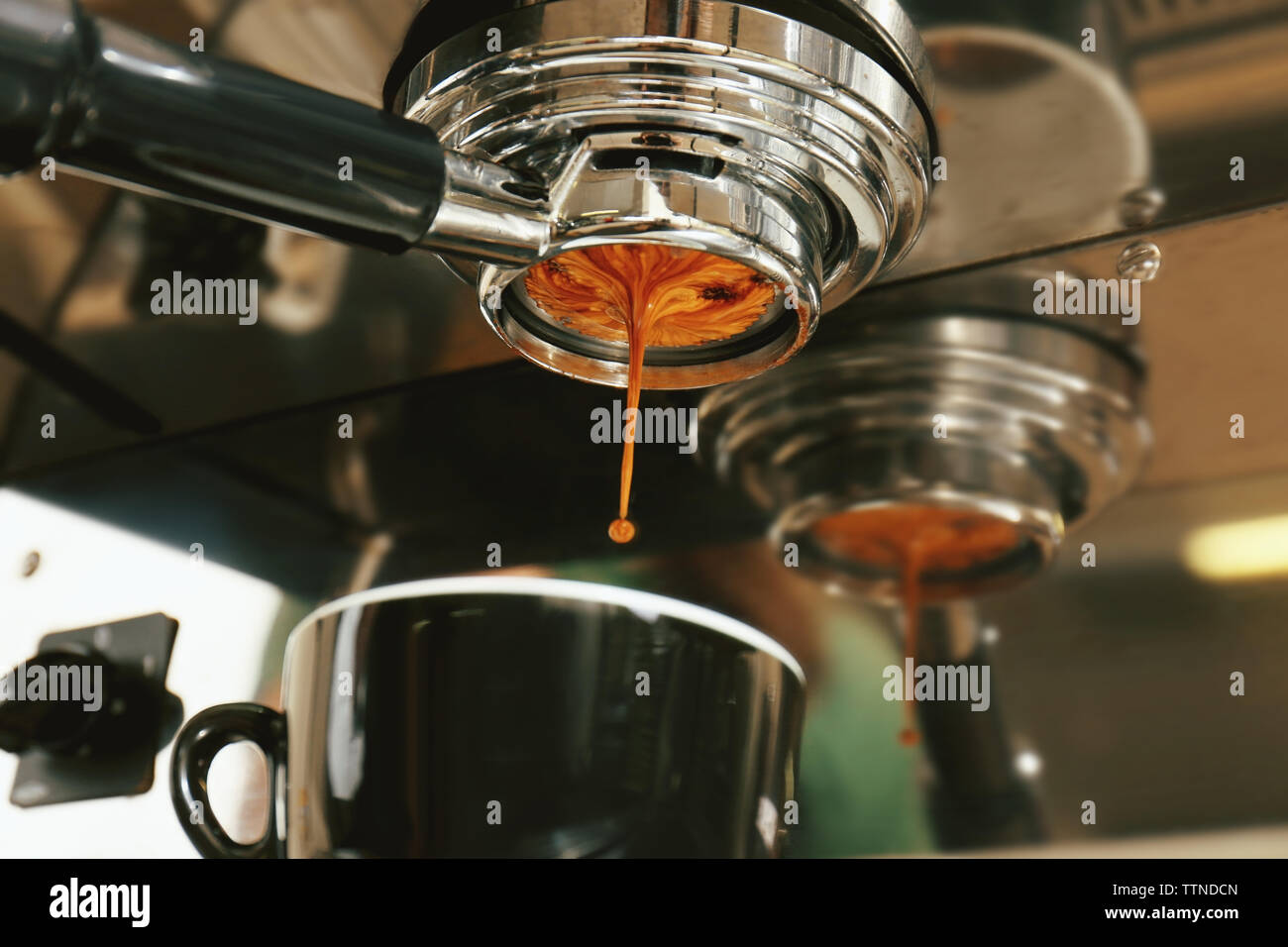 Automatic coffee machine preparing espresso Stock Photo - Alamy
