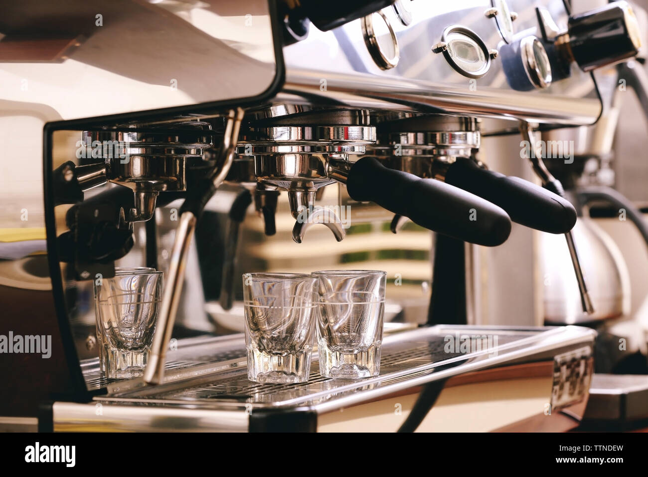 Automatic coffee machine preparing espresso Stock Photo - Alamy