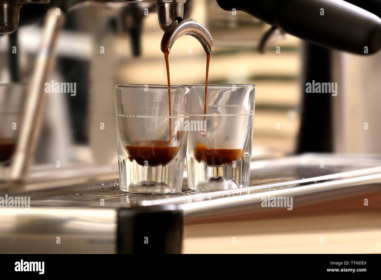 Automatic coffee machine preparing espresso Stock Photo - Alamy