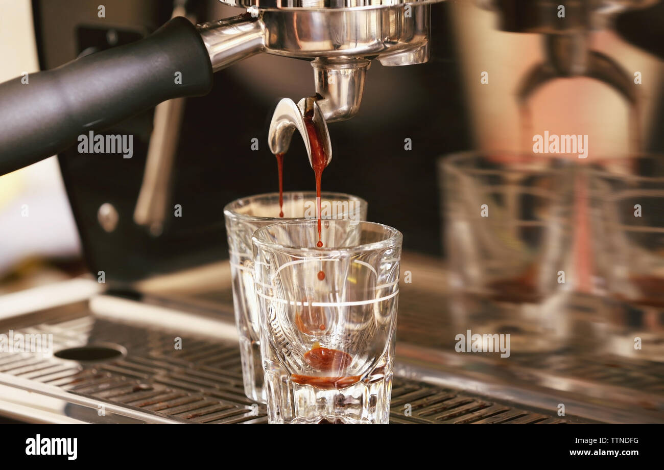 Automatic coffee machine preparing espresso Stock Photo - Alamy