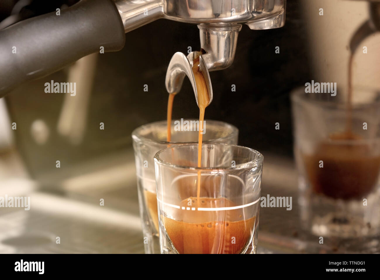 Automatic coffee machine preparing espresso Stock Photo - Alamy