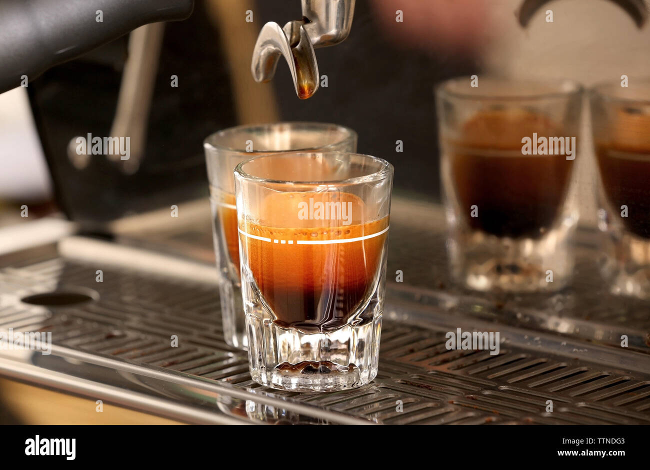 Automatic coffee machine preparing espresso Stock Photo - Alamy