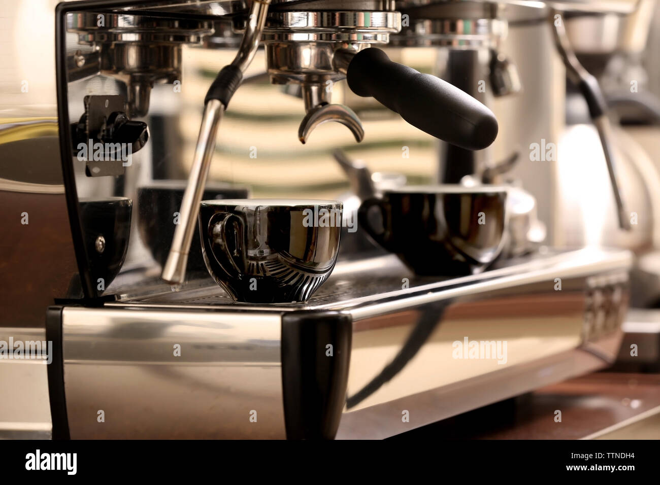 Automatic coffee machine preparing espresso Stock Photo - Alamy