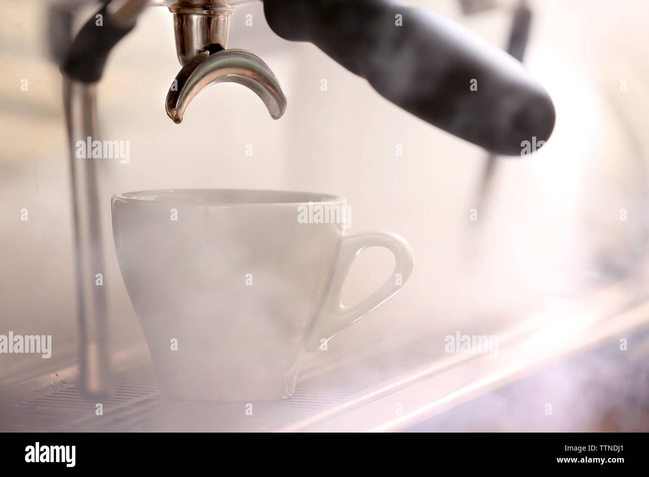 Automatic coffee machine preparing espresso Stock Photo - Alamy