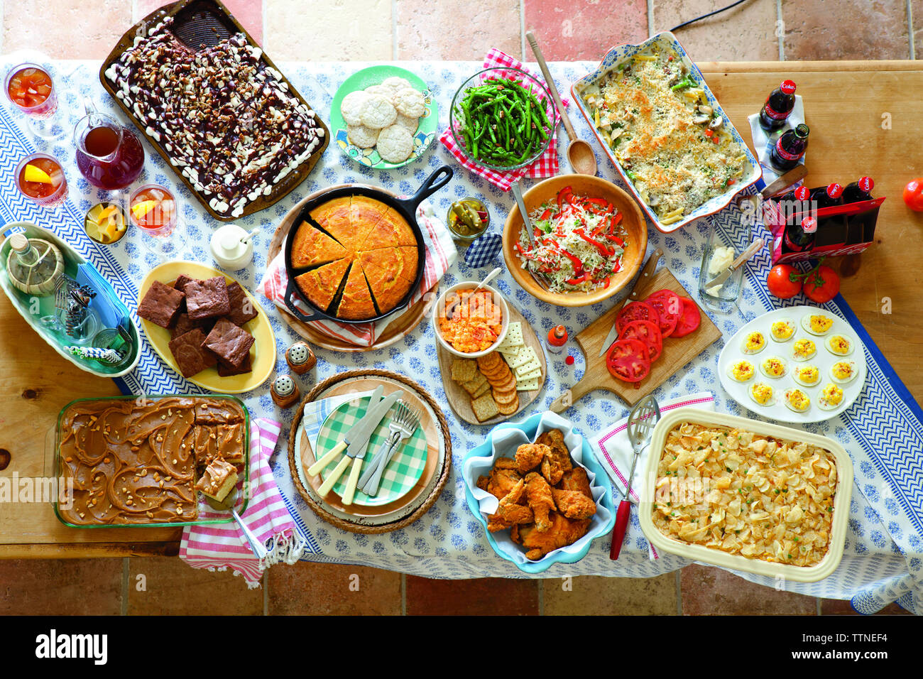 Overhead view of various fresh homemade food on table at home during ...