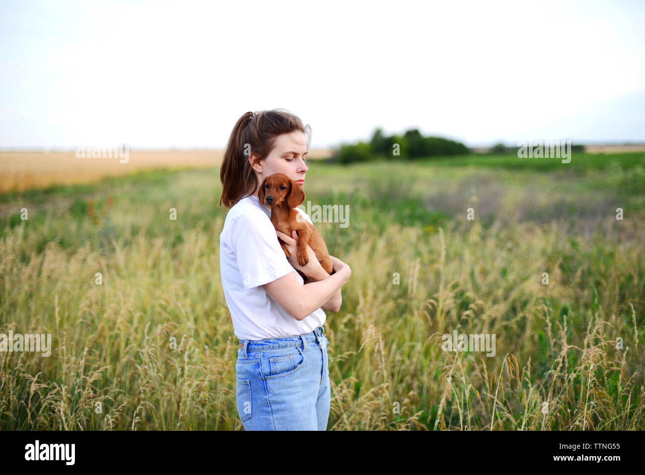 Beautiful woman hugging adorable hi-res stock photography and images ...