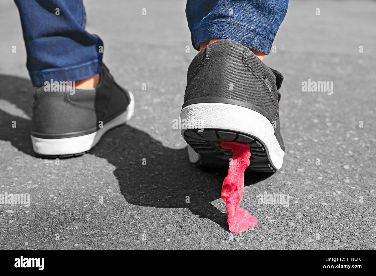 Foot stuck into chewing gum on street Stock Photo - Alamy