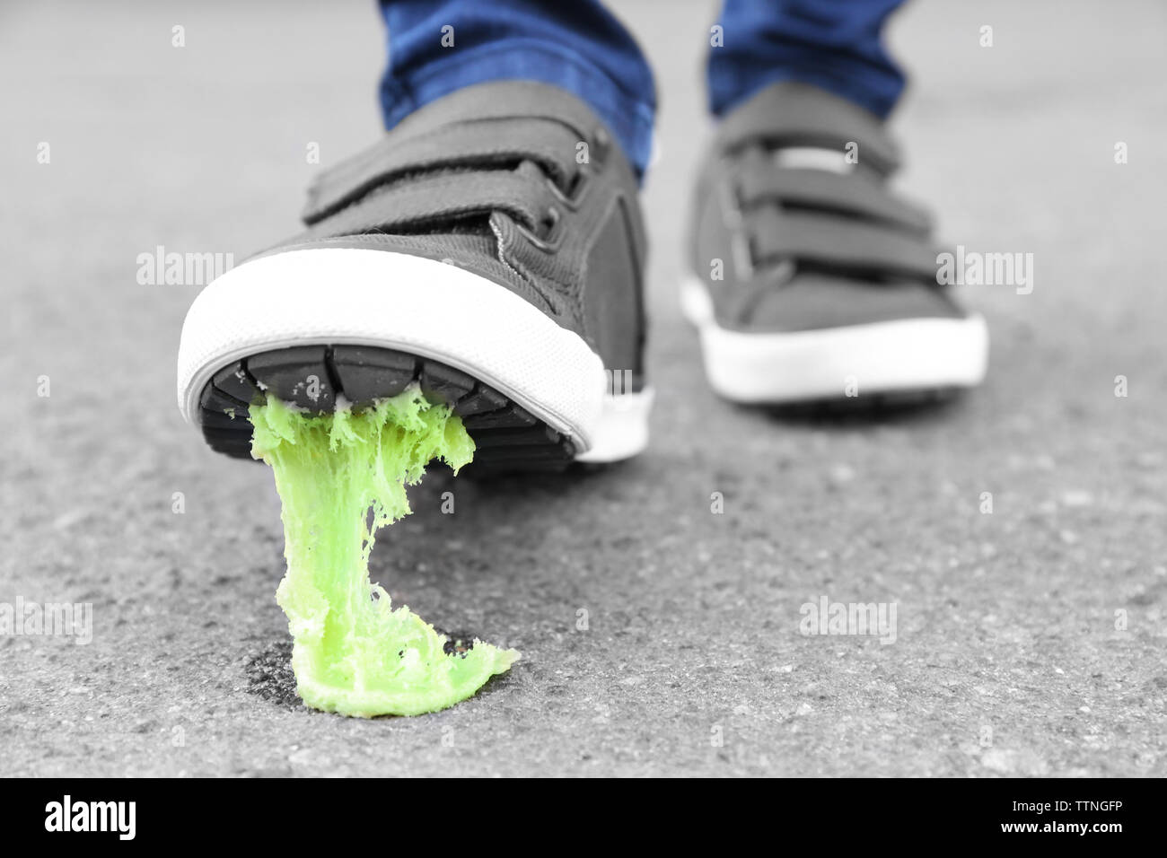 Foot stuck into chewing gum on street Stock Photo - Alamy