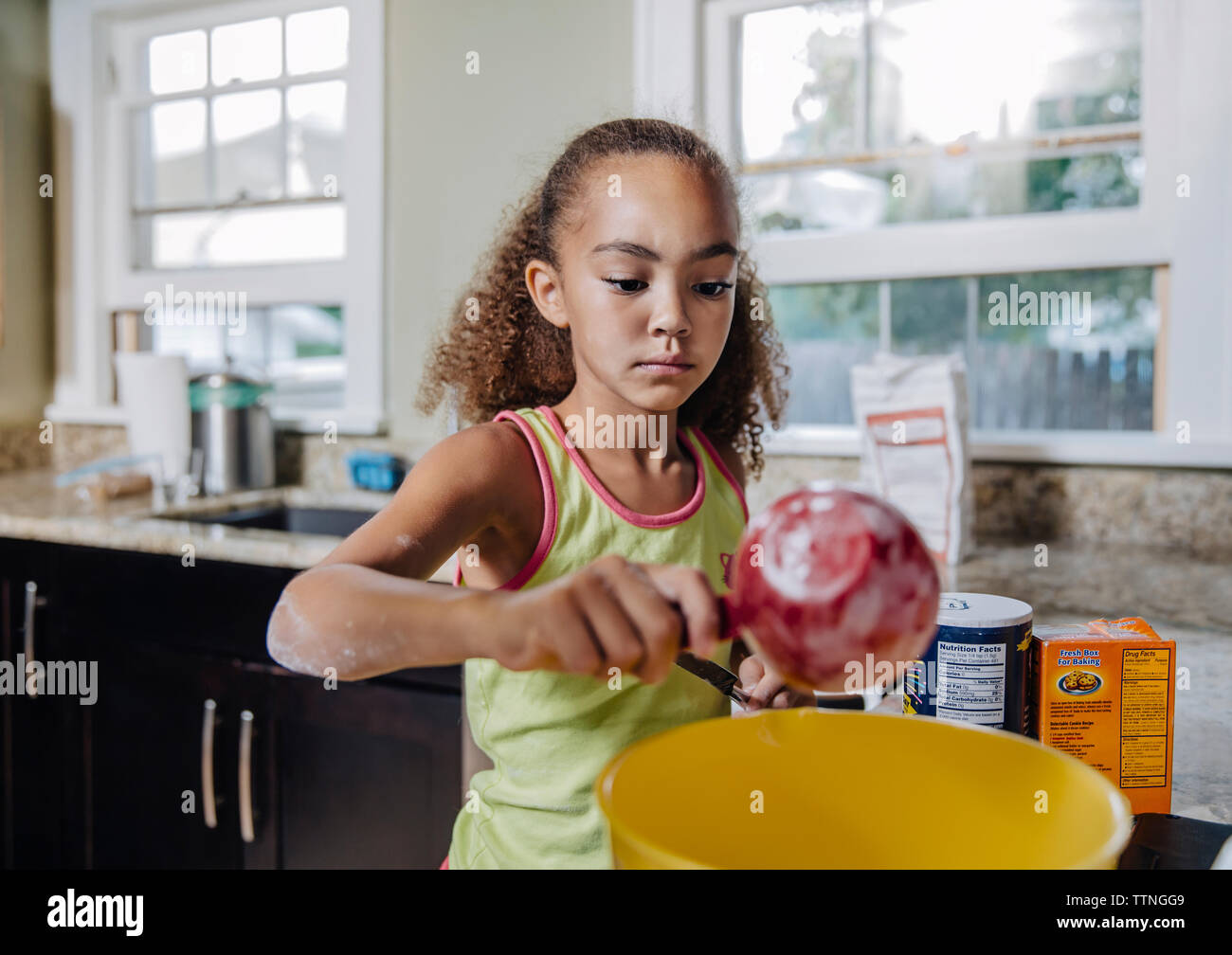 Cute girl baking flour hi-res stock photography and images - Alamy
