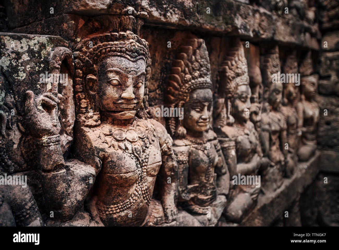 Sculptures on wall of Angkor Wat temple Stock Photo - Alamy