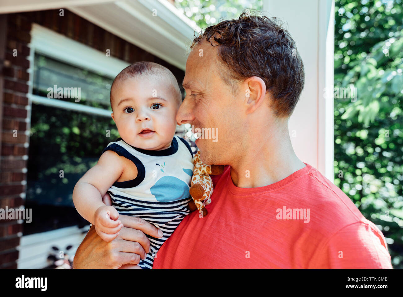 Adult boy carrying caucasian hi-res stock photography and images - Alamy