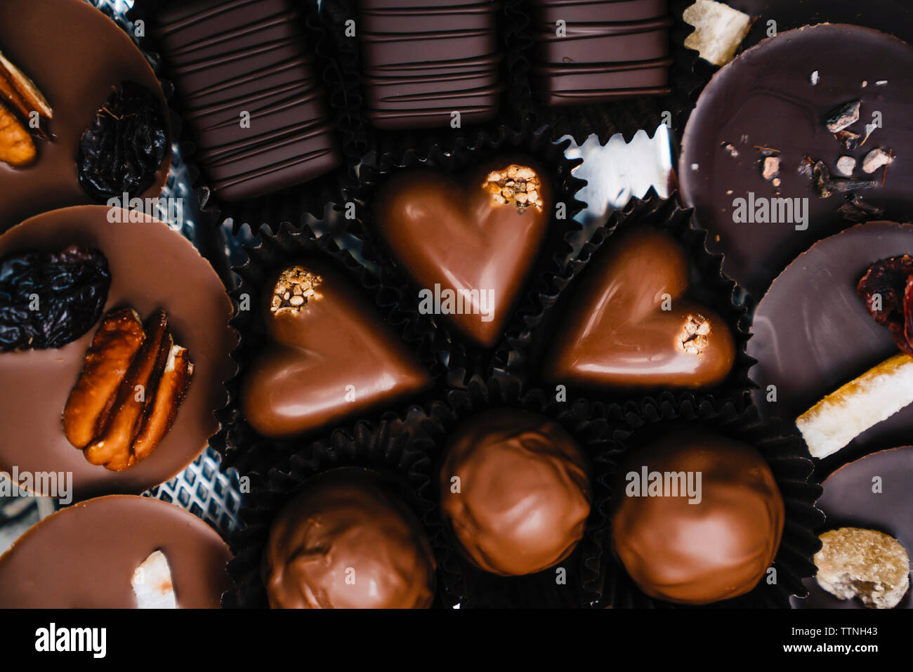 Overhead view of various chocolates at factory Stock Photo - Alamy
