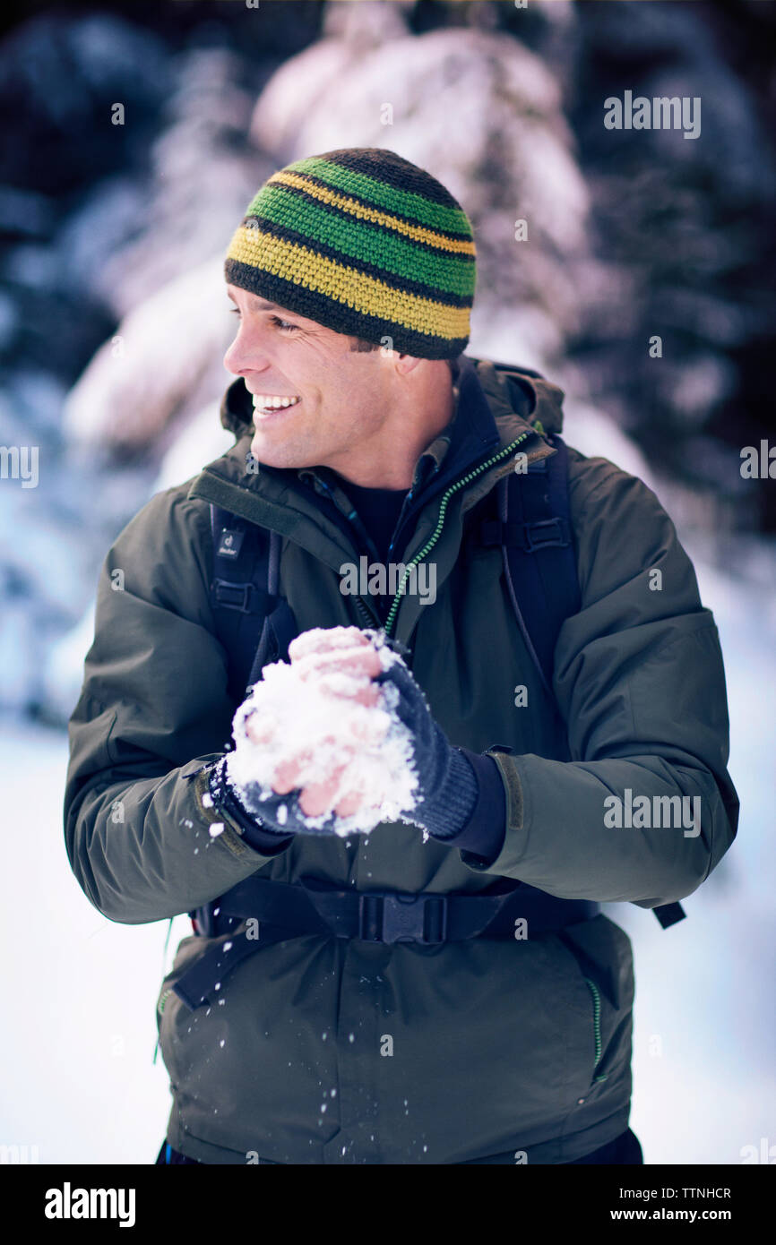 Man making snowball hi-res stock photography and images - Alamy