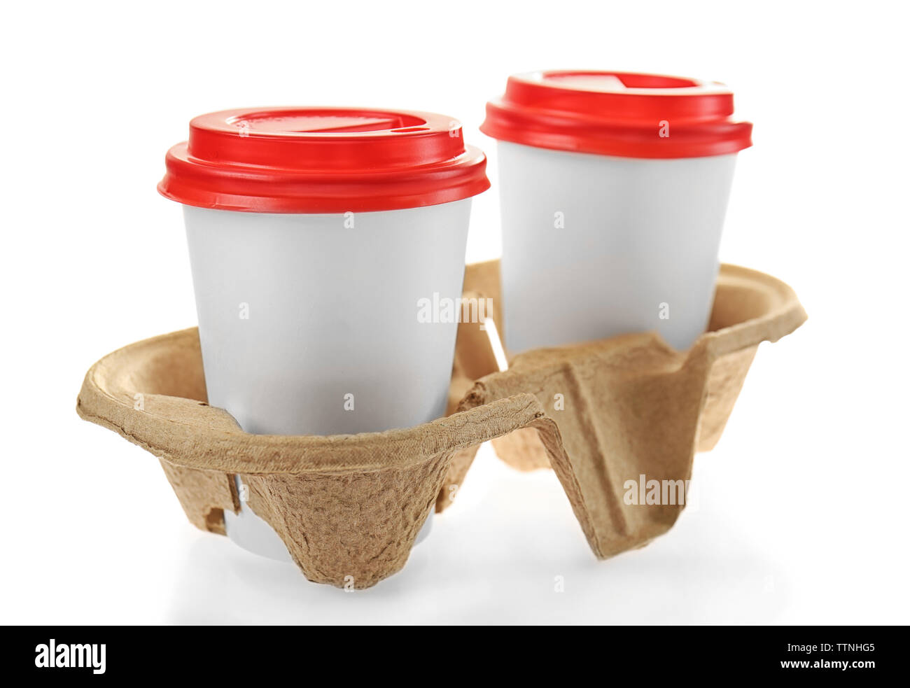 Coffee cardboard cups on a stand isolated on white Stock Photo - Alamy