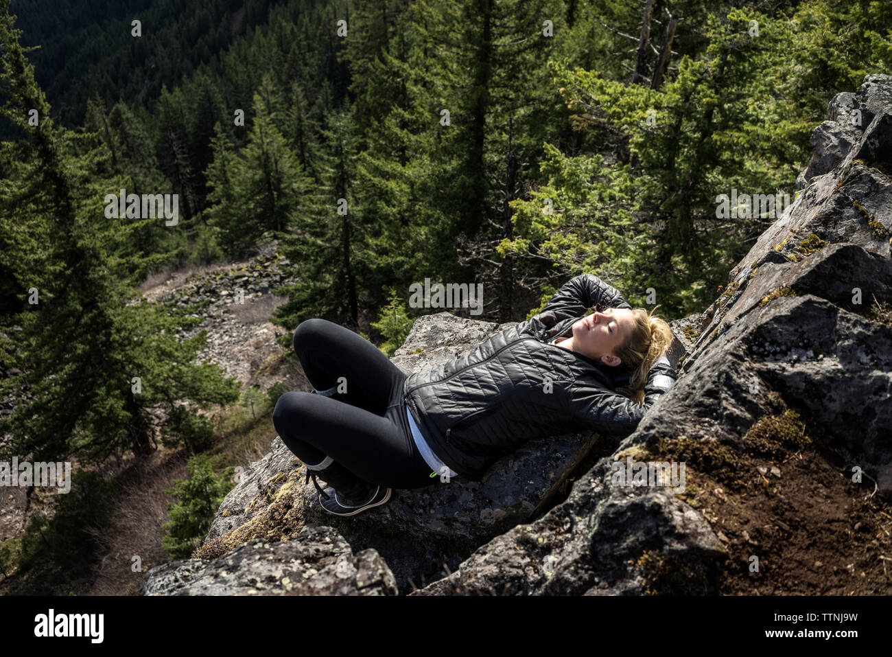 Woman lying mountains hi-res stock photography and images - Alamy