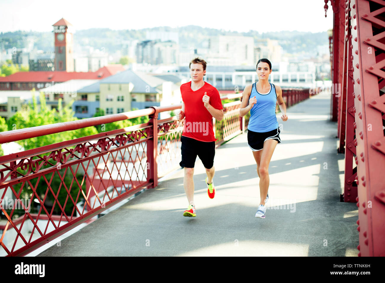 Male athletes running on bridge hi-res stock photography and images - Alamy
