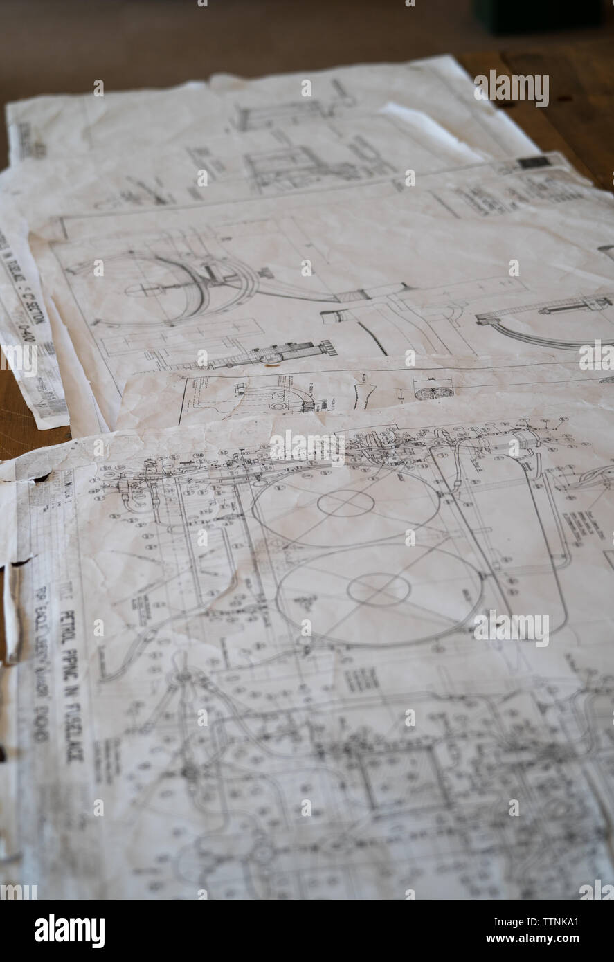 Engineer's plans / technical drawings on a desk. Aircraft plans Stock ...