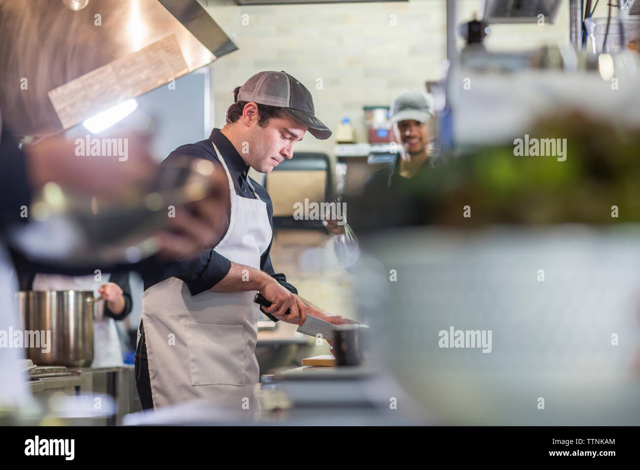 Working male restaurant hi-res stock photography and images - Alamy