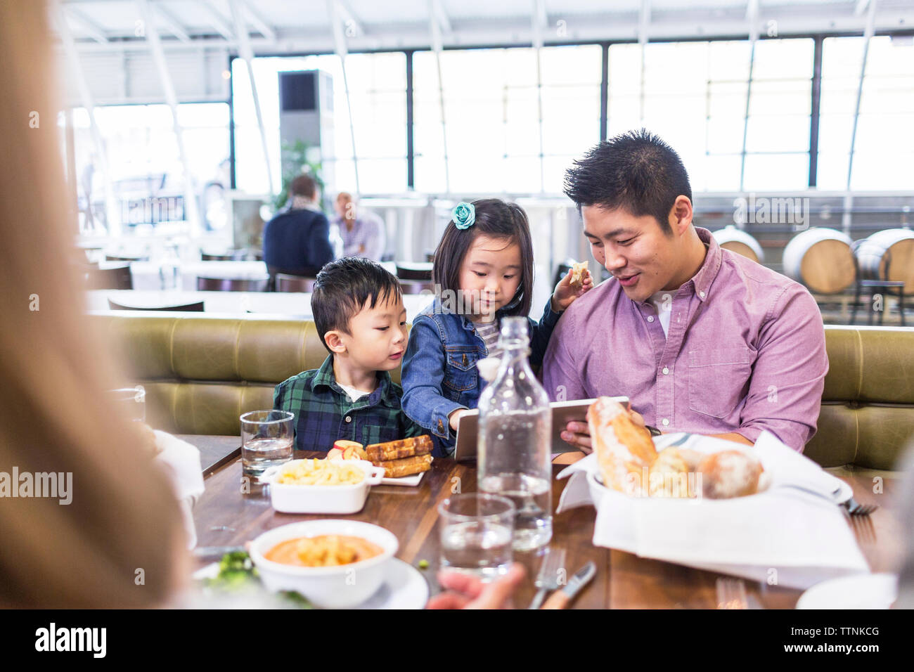 Children and tablet eating hi-res stock photography and images - Alamy