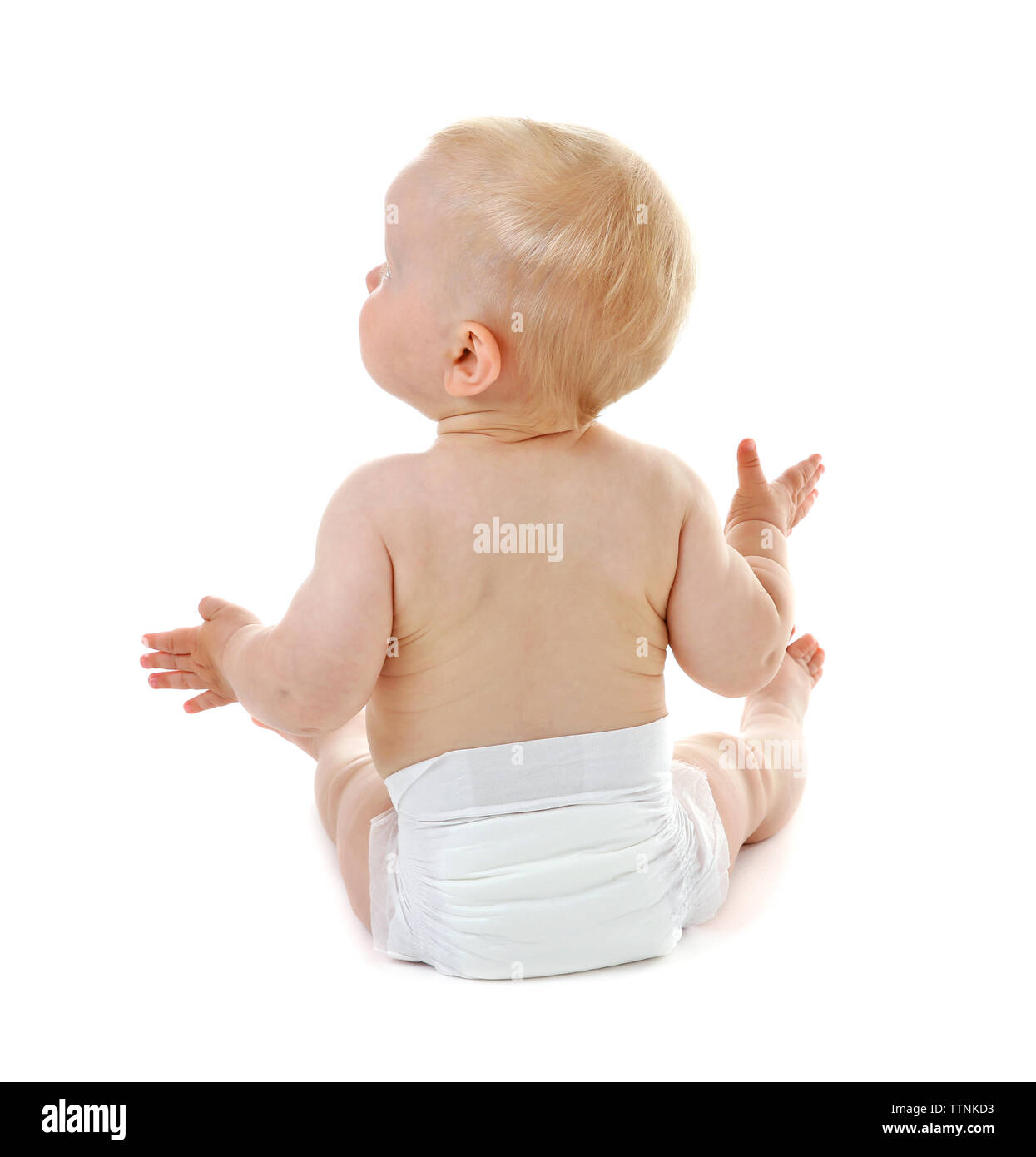 Baby sitting on white background Stock Photo - Alamy