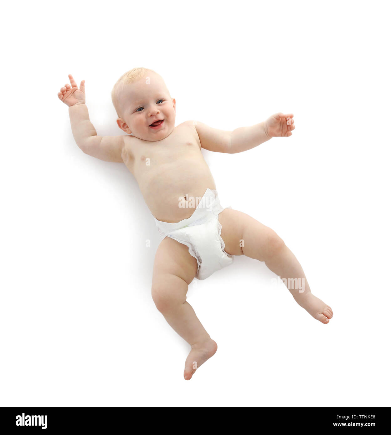 Cute baby lying on white background Stock Photo - Alamy