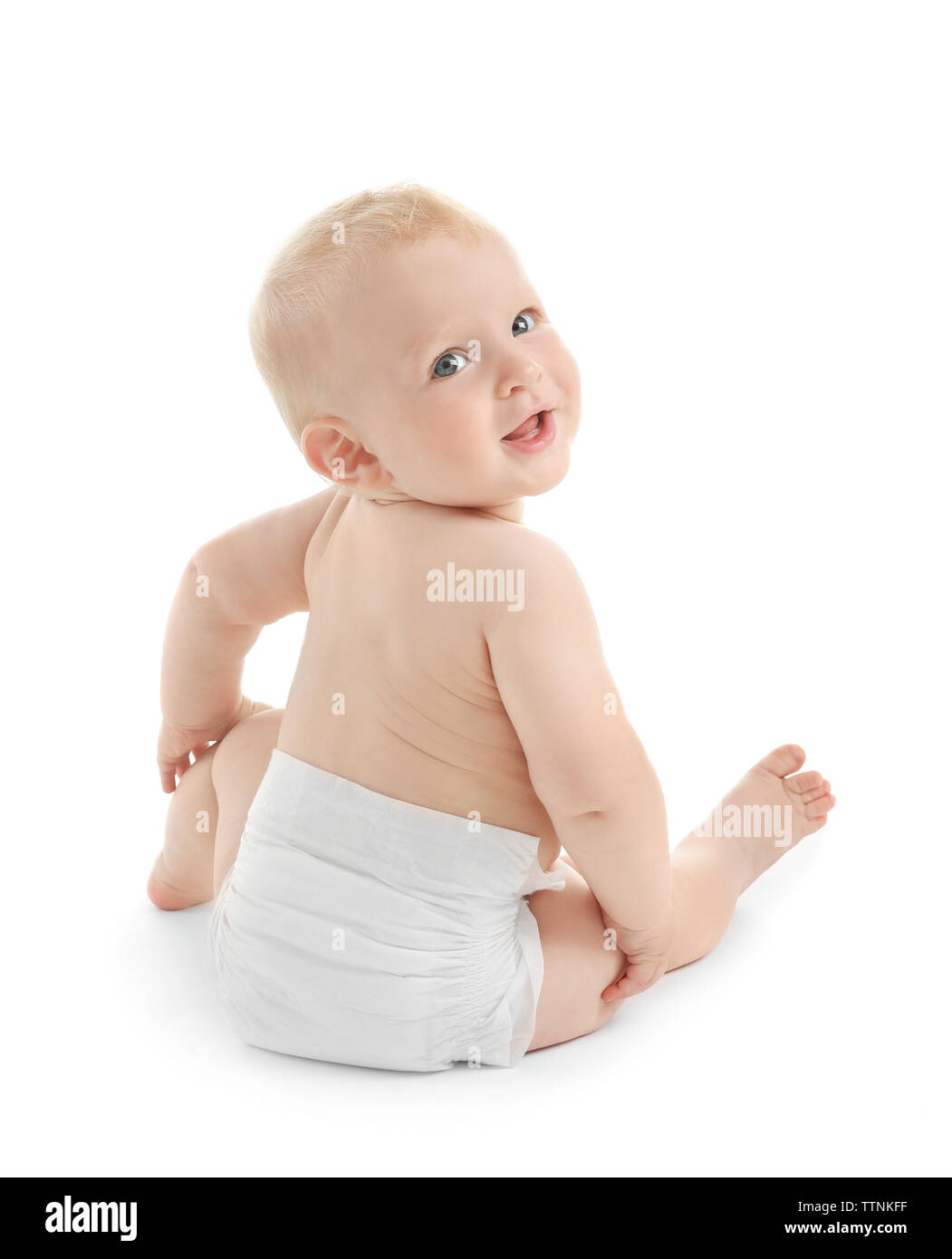Baby sitting on white background Stock Photo - Alamy
