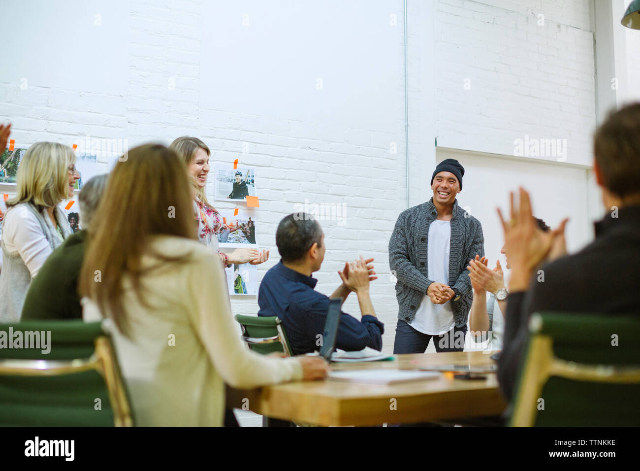business people clapping in meeting at office Stock Photo - Alamy