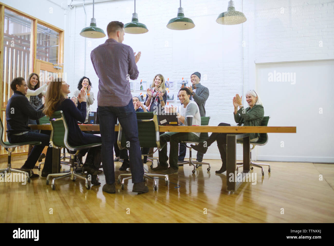 Indian business people standing clapping hi-res stock photography and ...