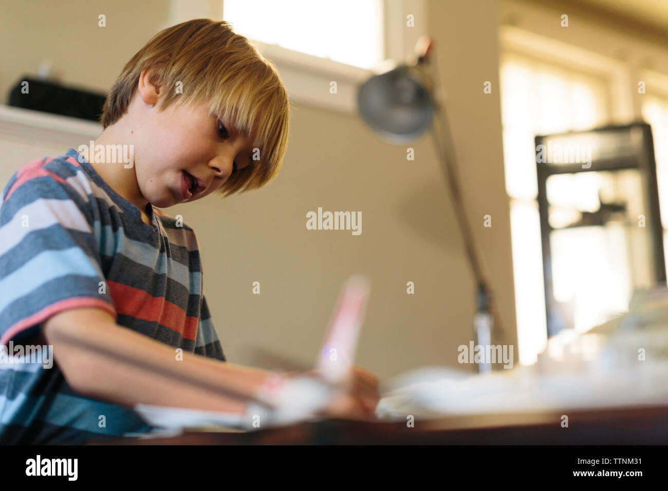 Boy studying hi-res stock photography and images - Alamy