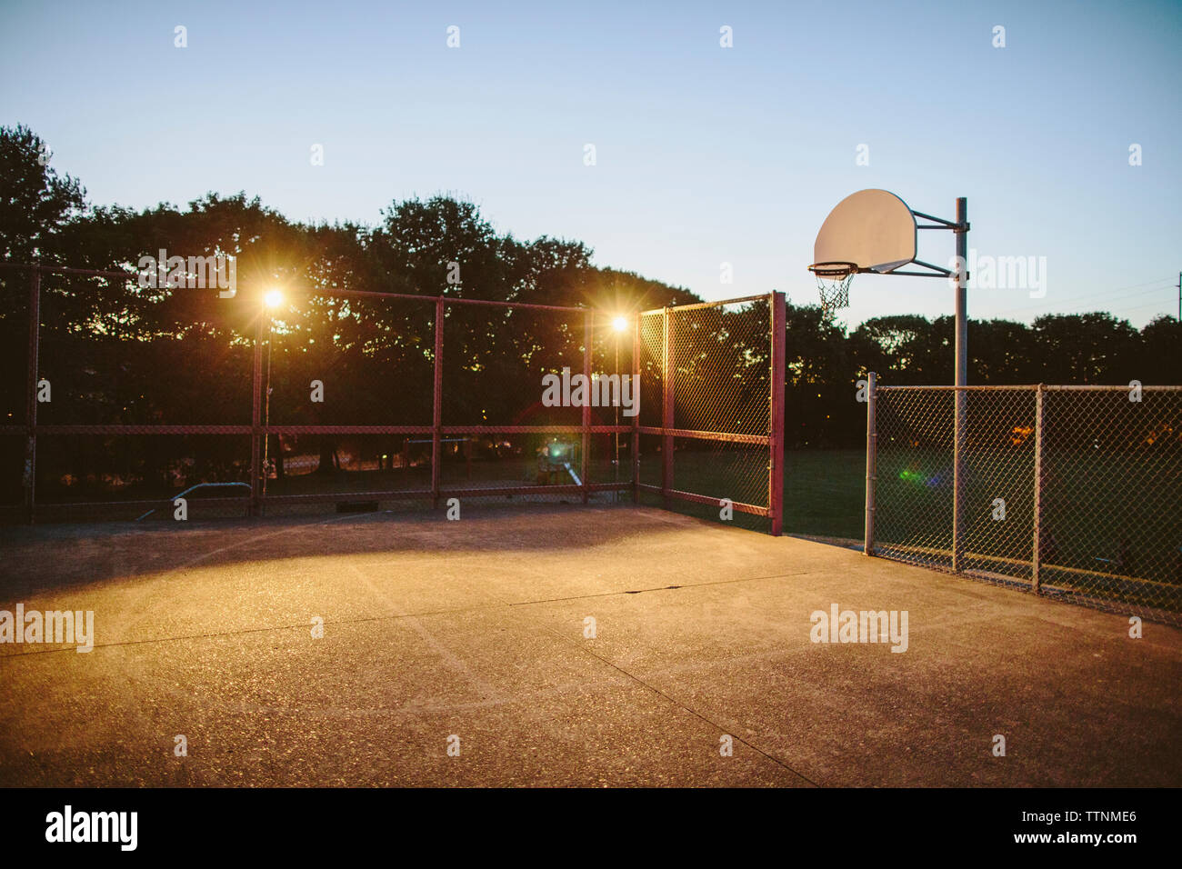 Illuminated basketball court against clear sky Stock Photo - Alamy
