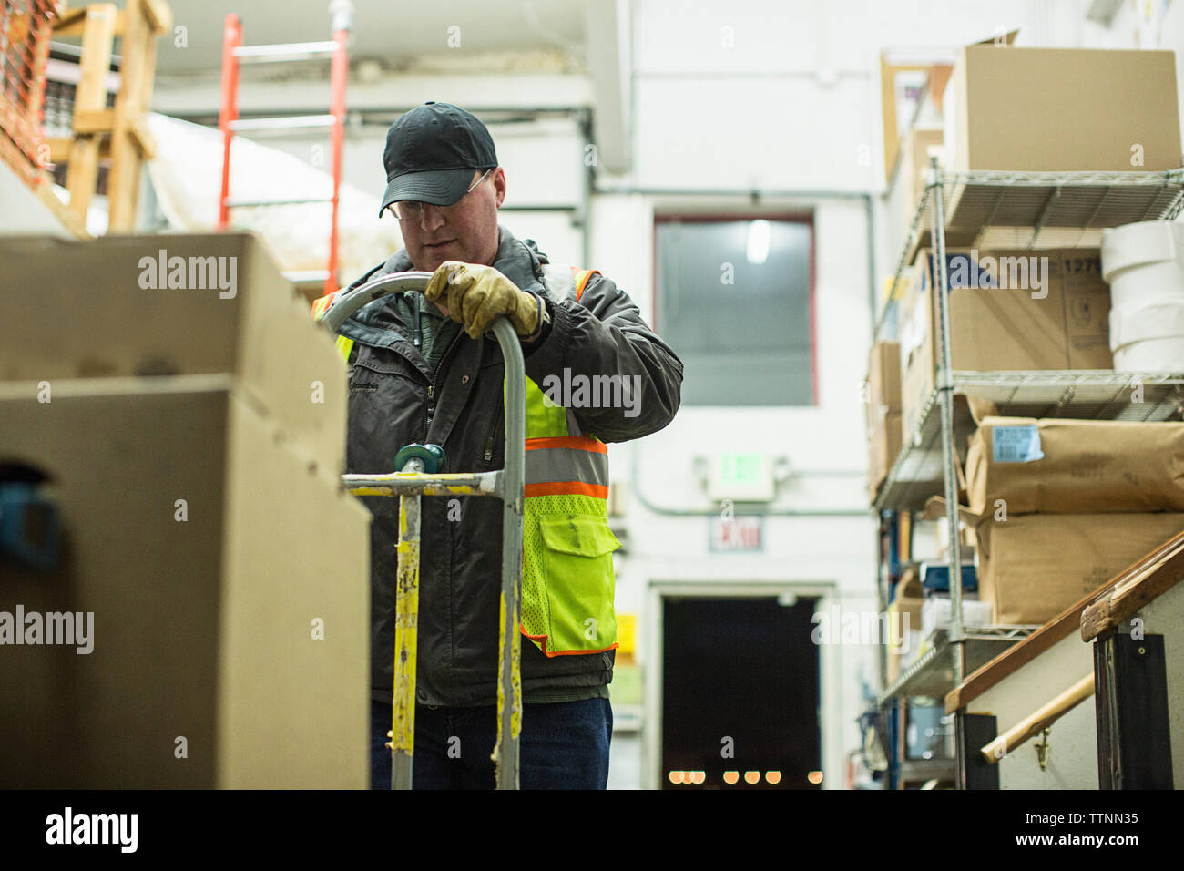 Male working in distribution warehouse hi-res stock photography and ...