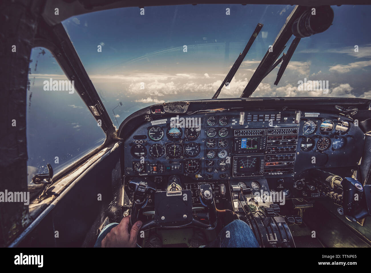 Low section of pilot flying airplane Stock Photo - Alamy