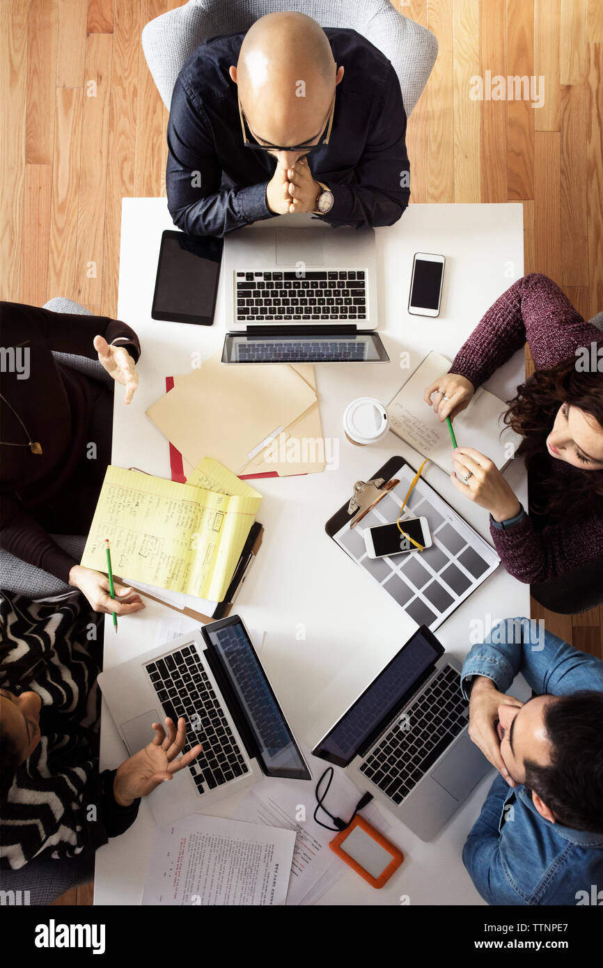 Overhead view of people at table hi-res stock photography and images ...