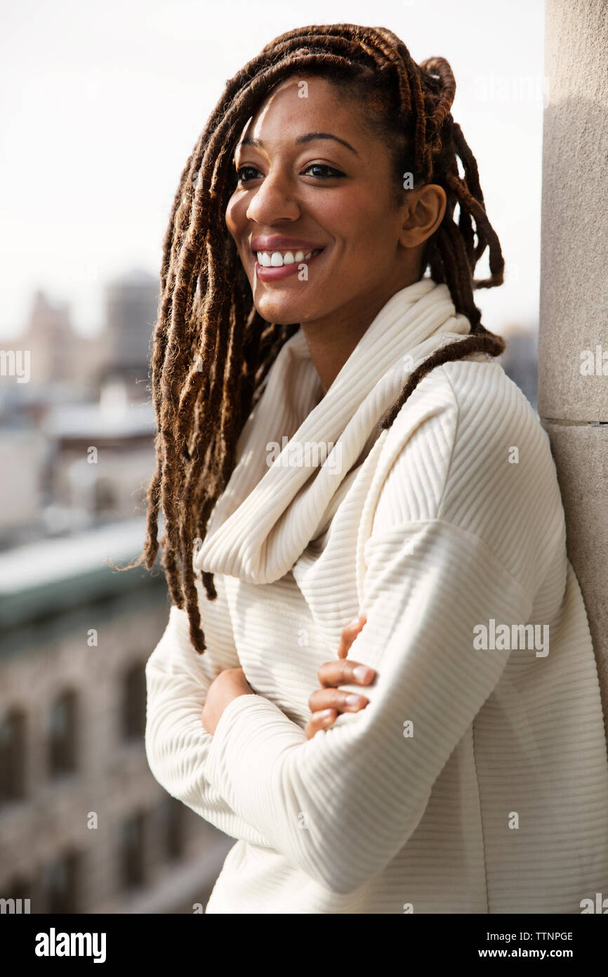 Looking away smiling standing close up hi-res stock photography and ...