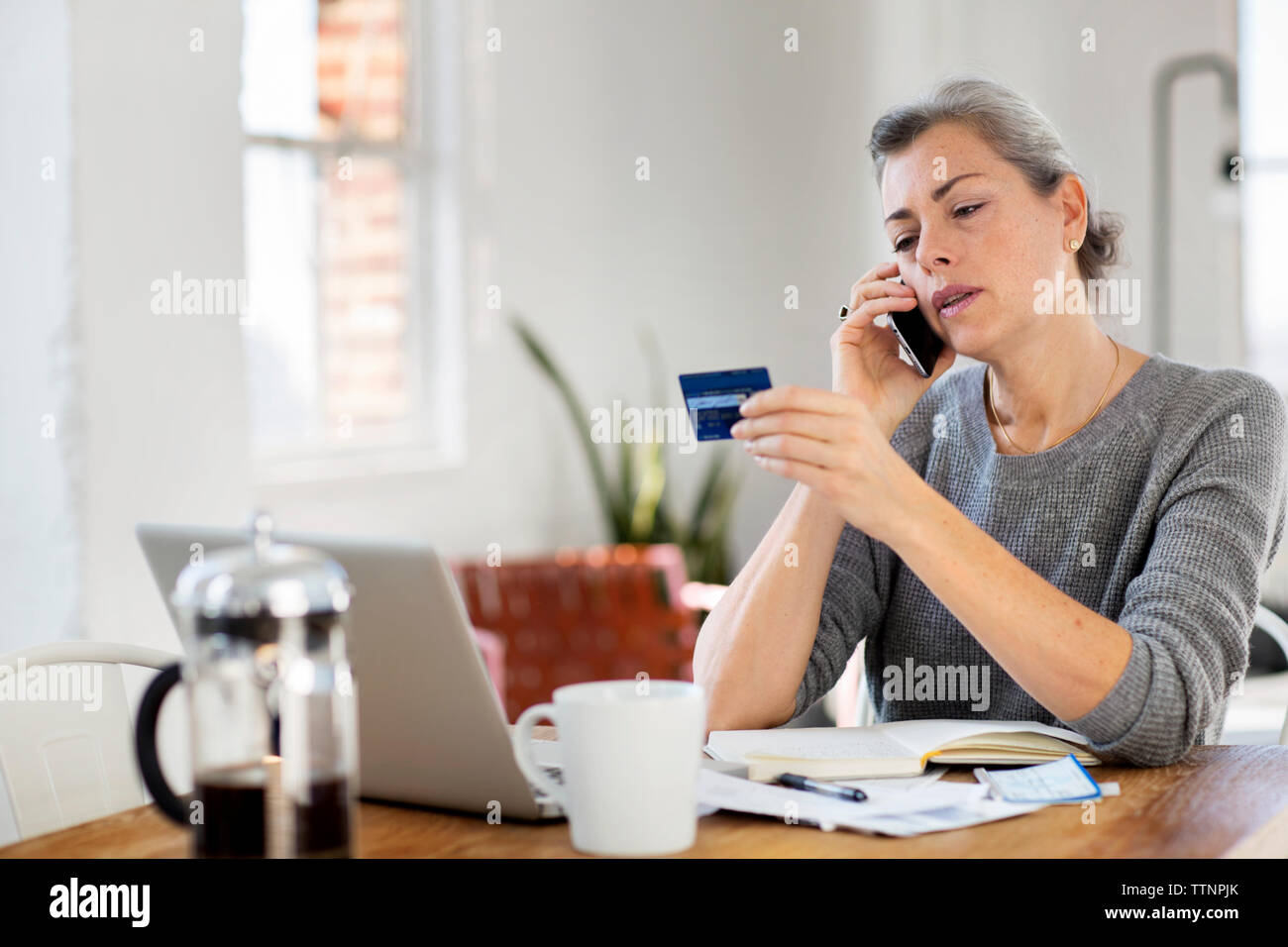 Holding debit hi-res stock photography and images - Alamy