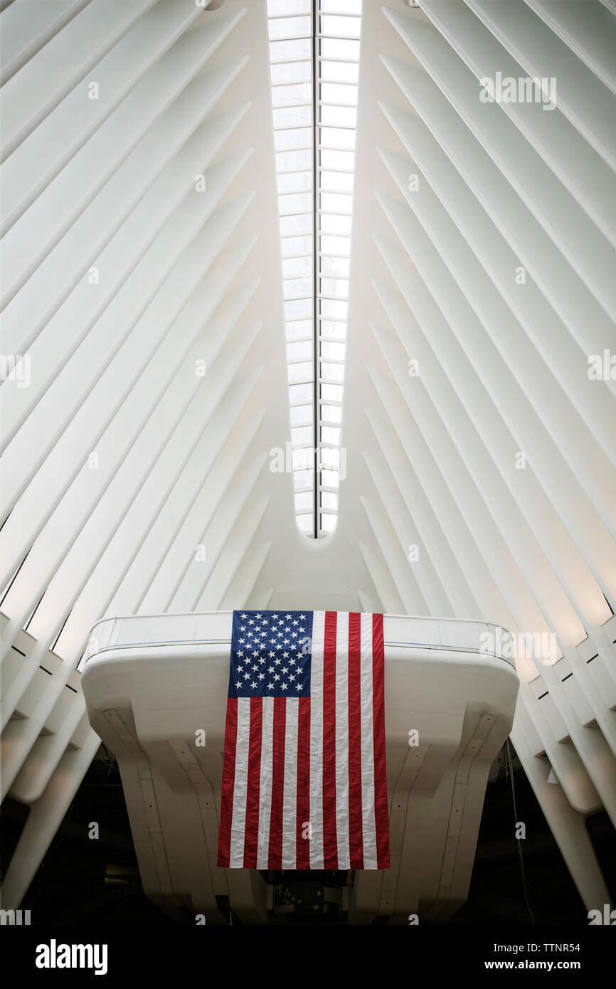 Low angle view of American flag and ceiling in One World Trade Center ...