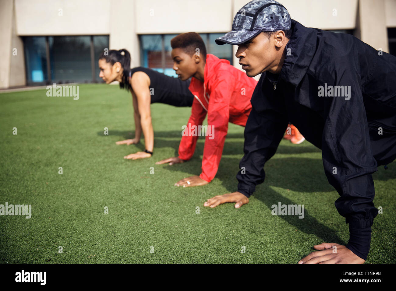 Group women doing push ups hi-res stock photography and images - Alamy