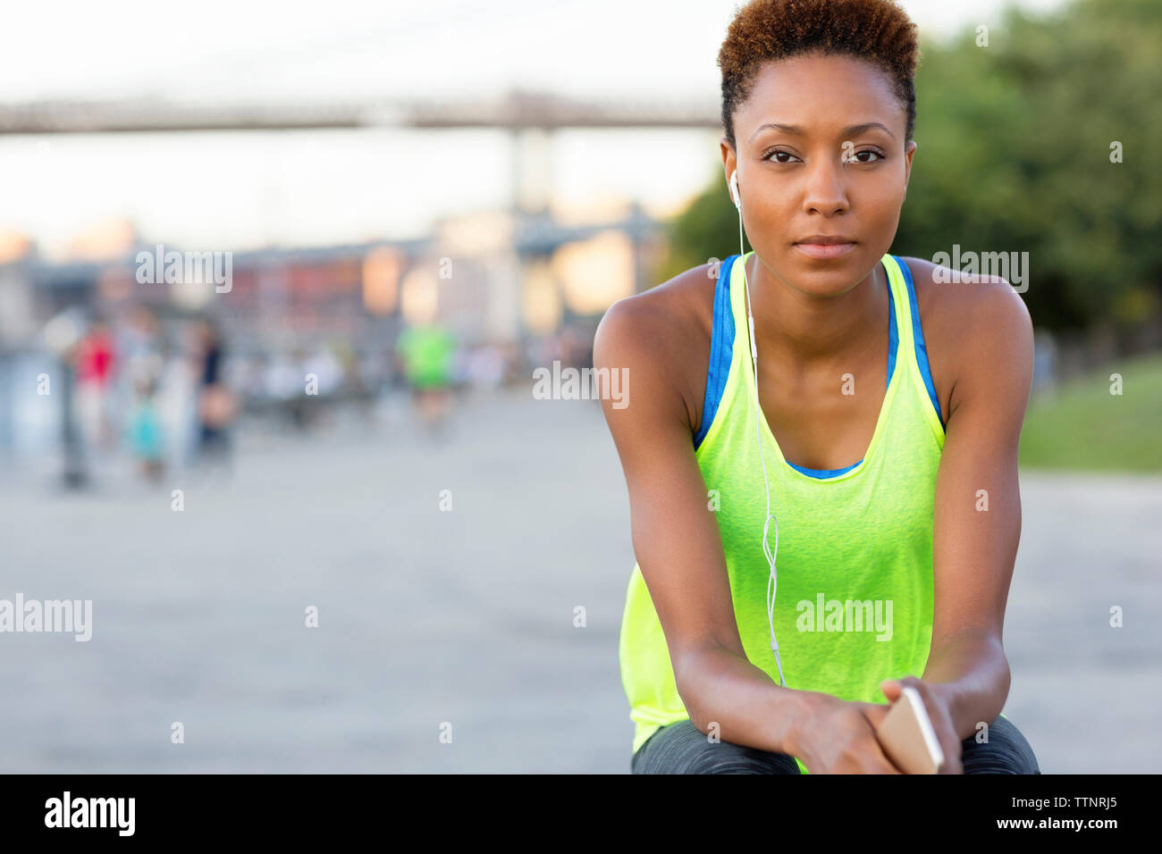 Portrait of athlete listening music Stock Photo - Alamy