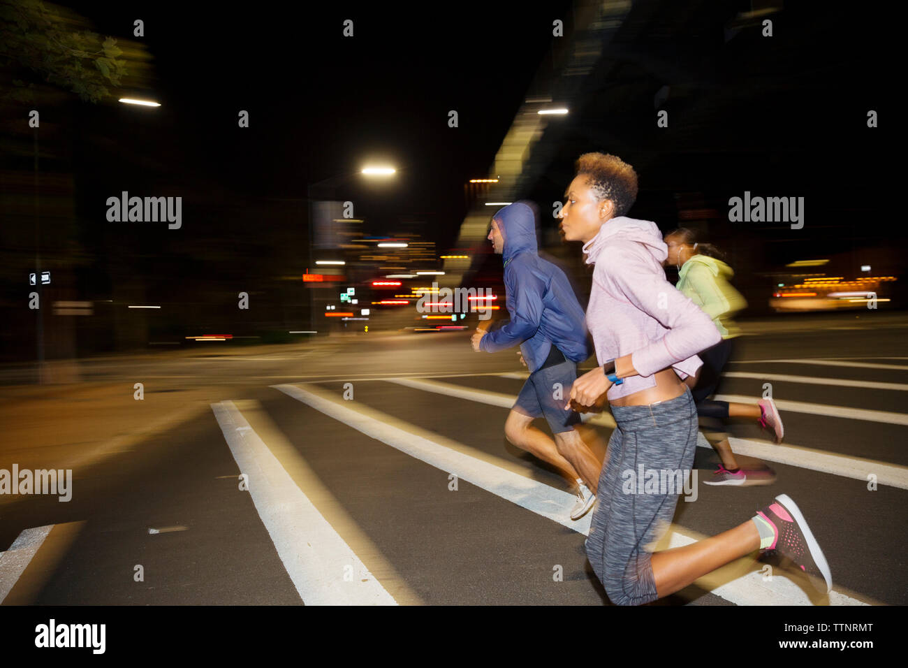 African woman running on street hi-res stock photography and images - Alamy