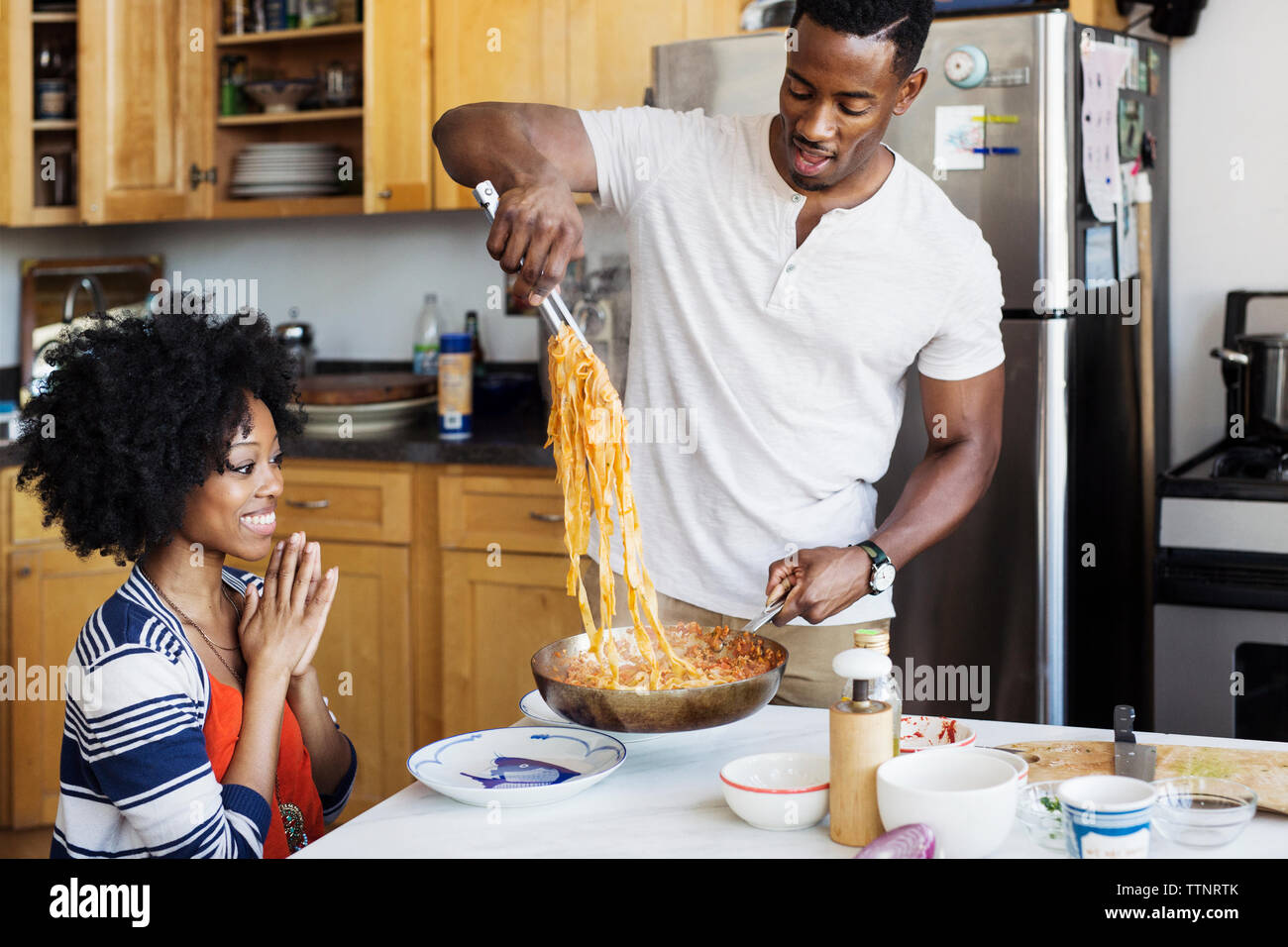 Man woman dining table hi-res stock photography and images - Alamy