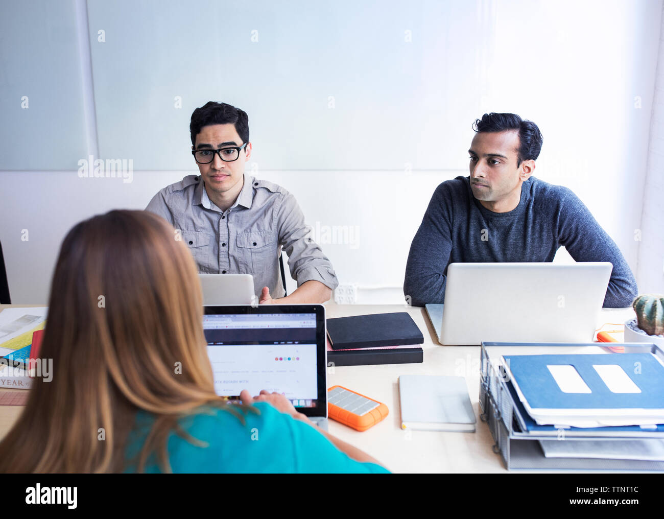Indian businesswomen using computers hi-res stock photography and ...