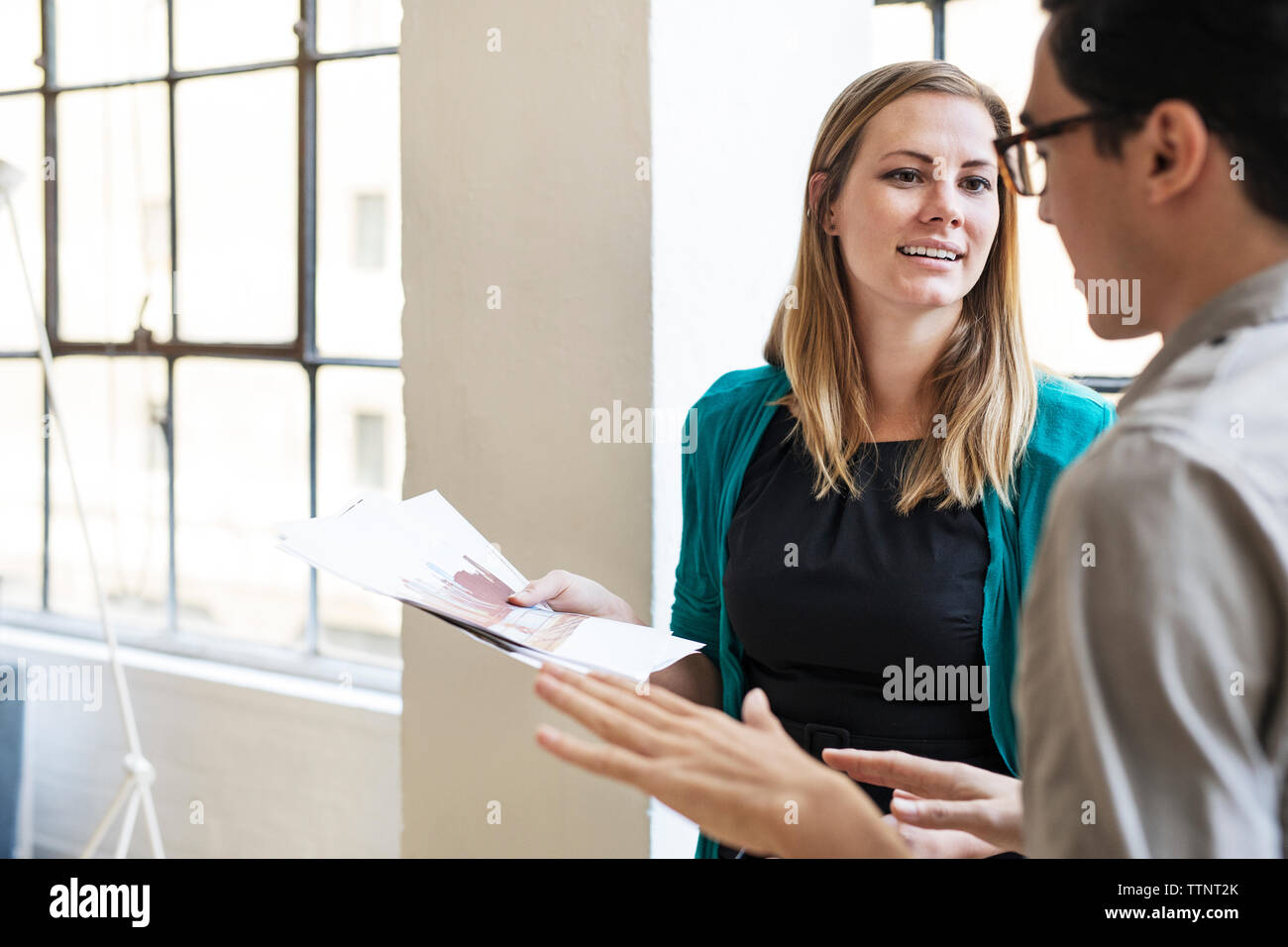 Business people discussing documents hi-res stock photography and ...