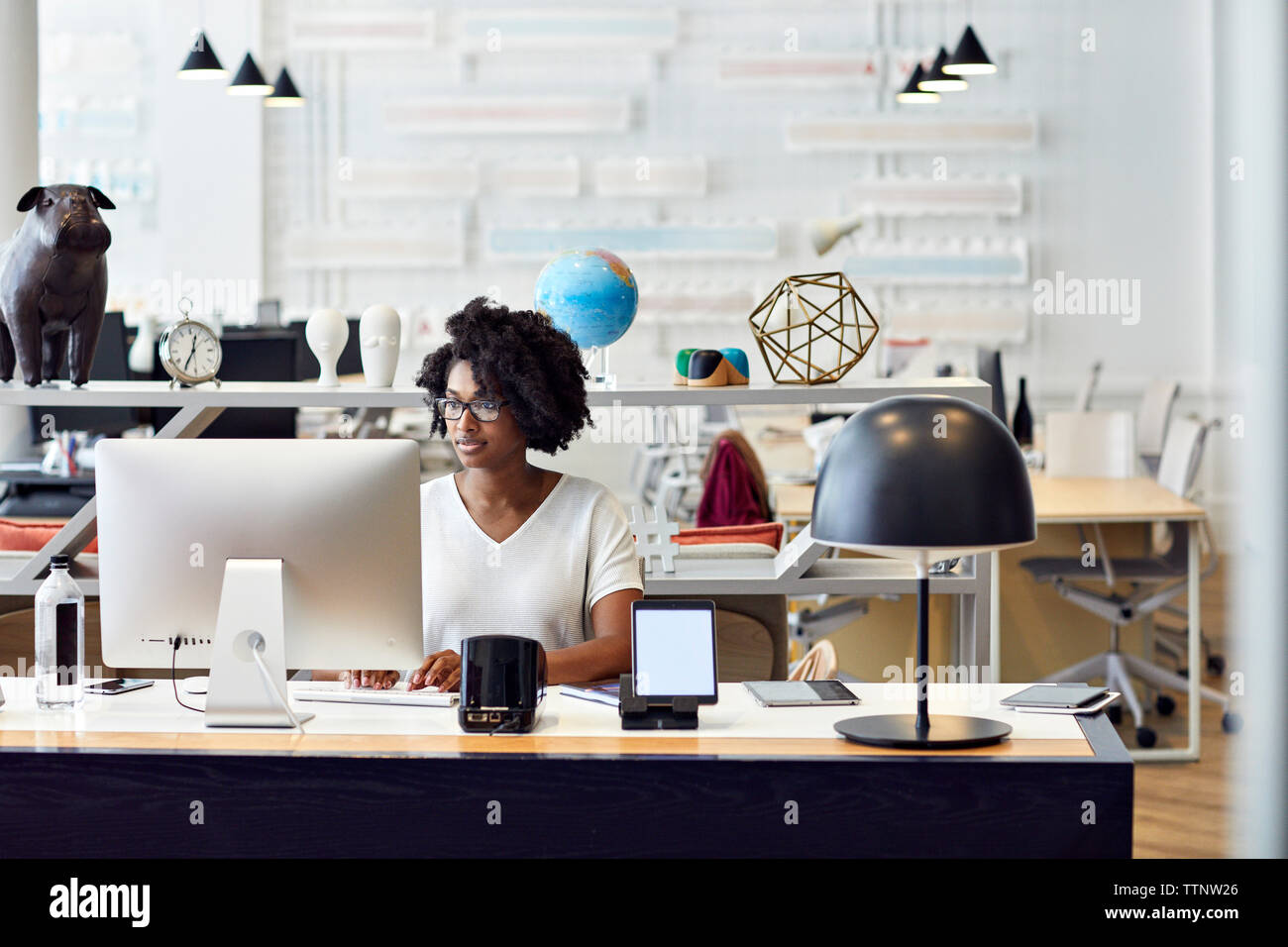 Working at desktop computer hi-res stock photography and images - Alamy