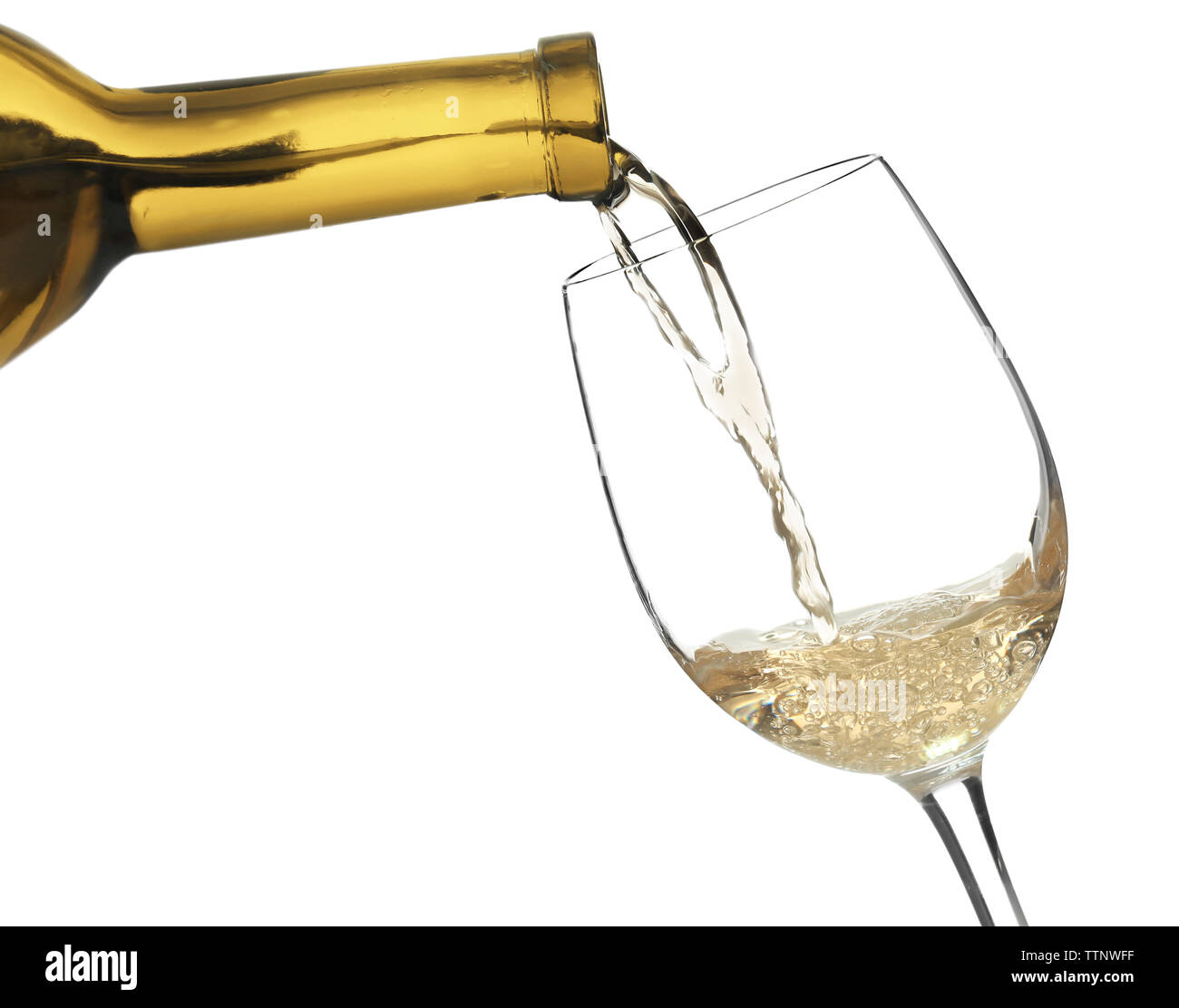 White wine pouring in glass, isolated on white Stock Photo - Alamy