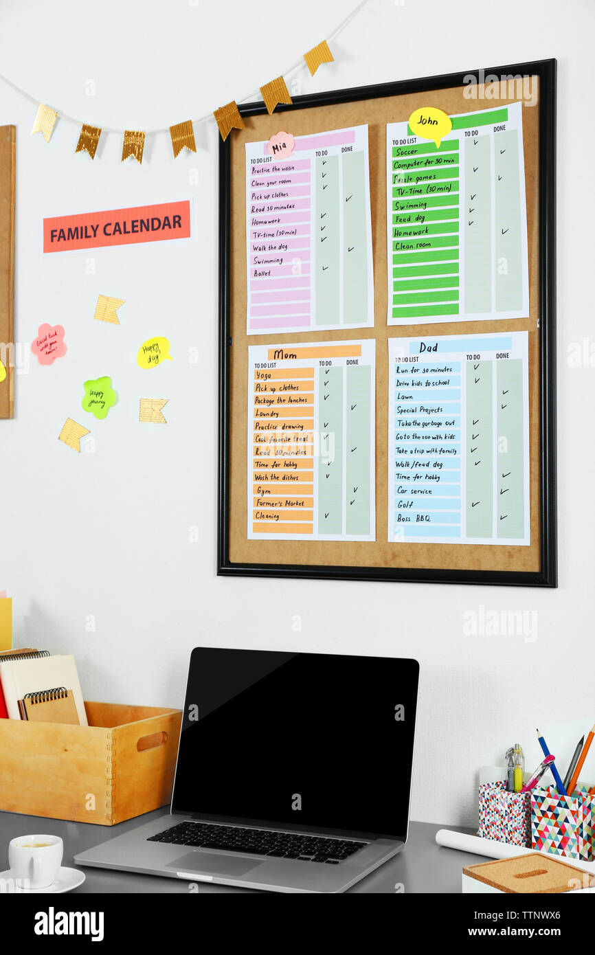 Family to-do list hanging on the wall Stock Photo - Alamy