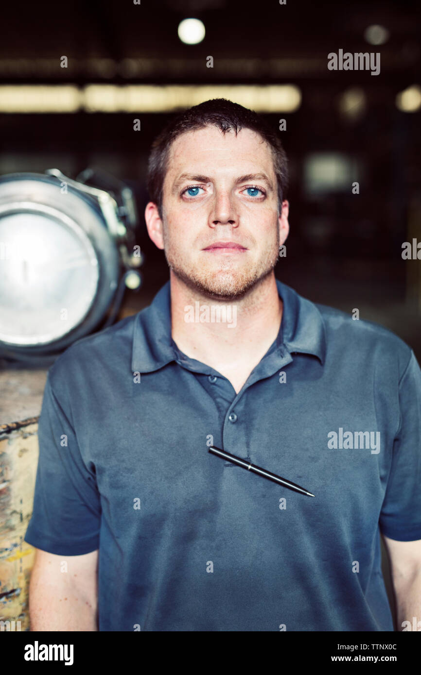 Close-up portrait of worker standing in industry Stock Photo - Alamy